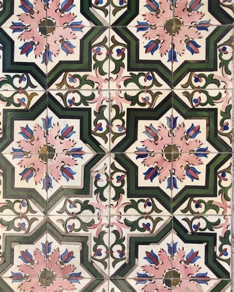 Intricately Designed Tile With Pink And Blue Flowers