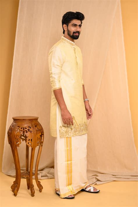 Golden Silk Kurta With Heavy Hand Embroidery Detailing On Placket And Sl