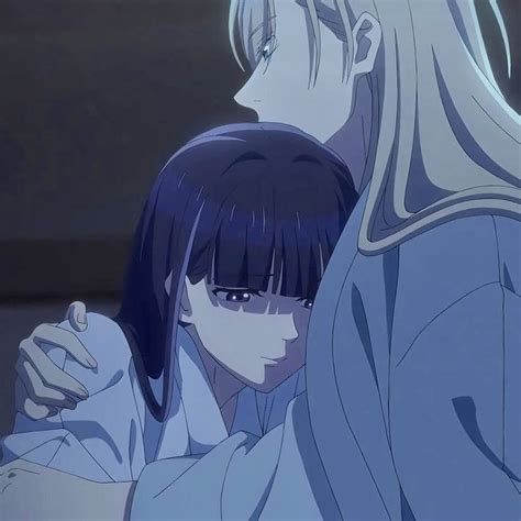 Two Anime Characters Are Hugging Each Other