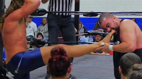 Wrestler Bites Hot Fighters Toe