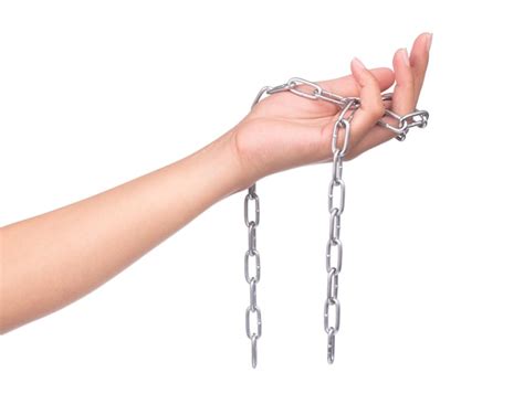 Premium Photo Hand Holding Steel Chain Isolated On White Background