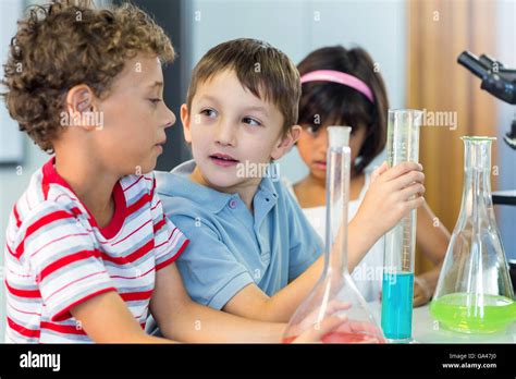 Checking With Classmate Hi Res Stock Photography And Images Alamy