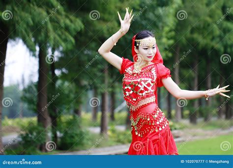 Asian Chinese Beauty Belly Dancer Dancing On Grass Stock Image Image