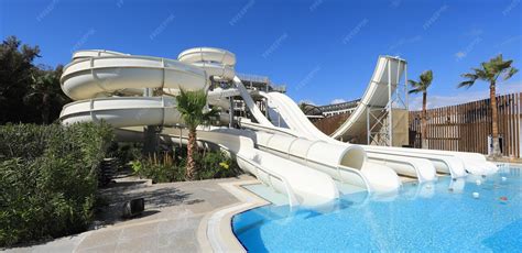 Premium Photo Water Park Summer Water White Slides And Attractions In