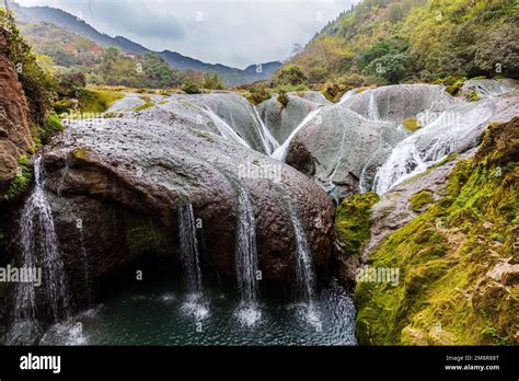 Huangguoshu Waterfall In Guizhou Anshun Seven Star Bridge Sank Beach