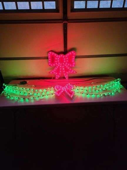Lighted Bow And Foldable Bow With Swag Legacy Auction Company