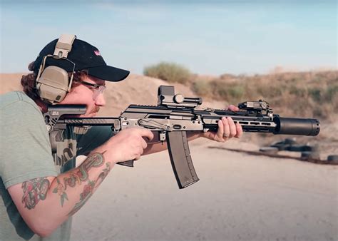 Micah Mayfield With A Modded Ak 102 Popular Airsoft Welcome To The