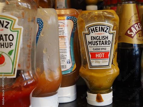 Bottles Of British Condiments Inside A Pub Restaurant Mayonnaise Vinegar Tomato Ketchup