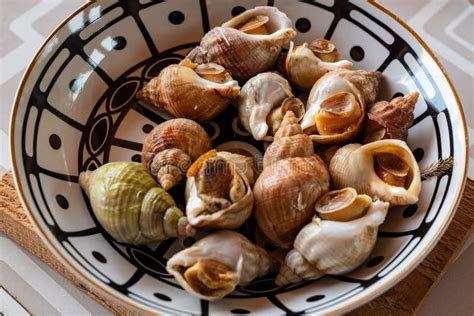 Edible Sea Snails In A Bowl Served In France As A Gourmet Appetizer