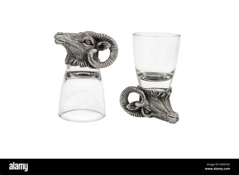Two Empty Glasses For Vodka With Rams Head On The Bottom Isolated On