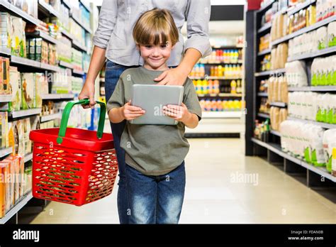 Mother And Son Using Tablet Stock Photo Alamy