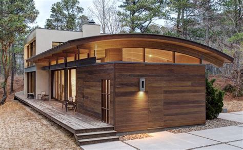 Modern House With Curved Roof In The Woods Quonset Hut Roof Modern