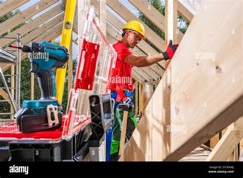 Caucasian Contractor Assembling Wooden Building Structure Tool Boxes