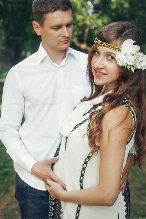 Responsible Husband Hugging Beautiful Stylish Wife In Retro White Dress