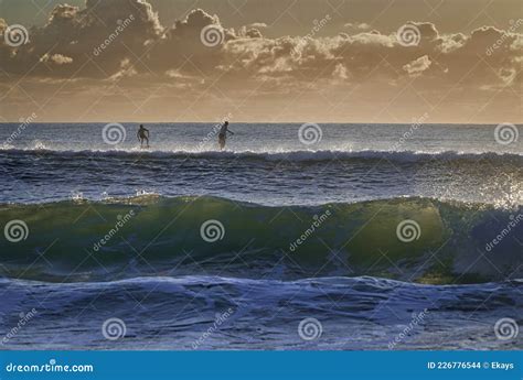 Surfers Paradise Men Surfing In The Cool Water Editorial Stock Image