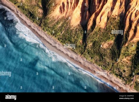 Aerial View Of The Rugged Sellicks Beach Cliffs With Blue Ocean Waves