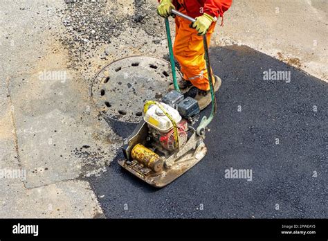 Vibratory Plate Compactor Machine For Paving Work On The Street Stock