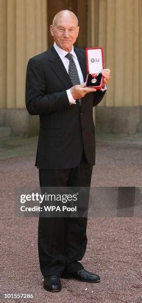 Actor Sir Patrick Stewart Poses With His Award After He Was Knighted