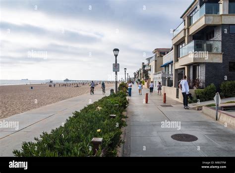 People Enjoying The Strand At Manhattan Beach In Los Angeles County