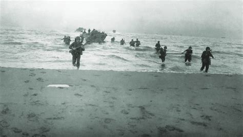 143rd Infantry Regiment Combat Team Running Onto A Beach On The Gulf Of