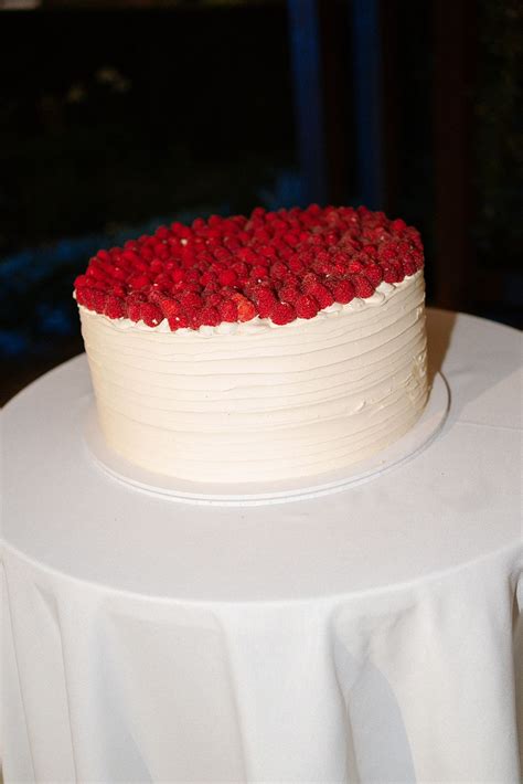 Italian Wedding Cake With Red Flower Decor