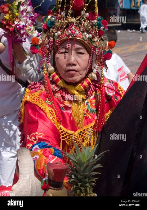 Priestess In A Trance At The Bizarre Vegetarian Festival In Phuket
