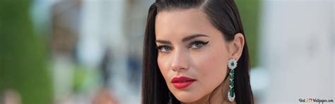 Adriana Lima With Straight Hair And Red Lips Before Attending A Meeting