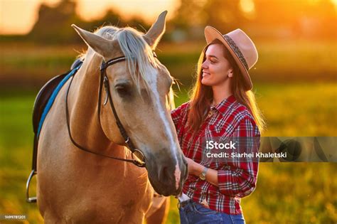 Young Cute Happy Joyful Satisfied Smiling Cowgirl With Beautiful Blond