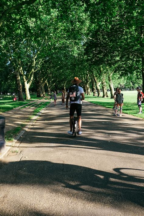 People Walking On The Street During Daytime Photo Free Victoria Park