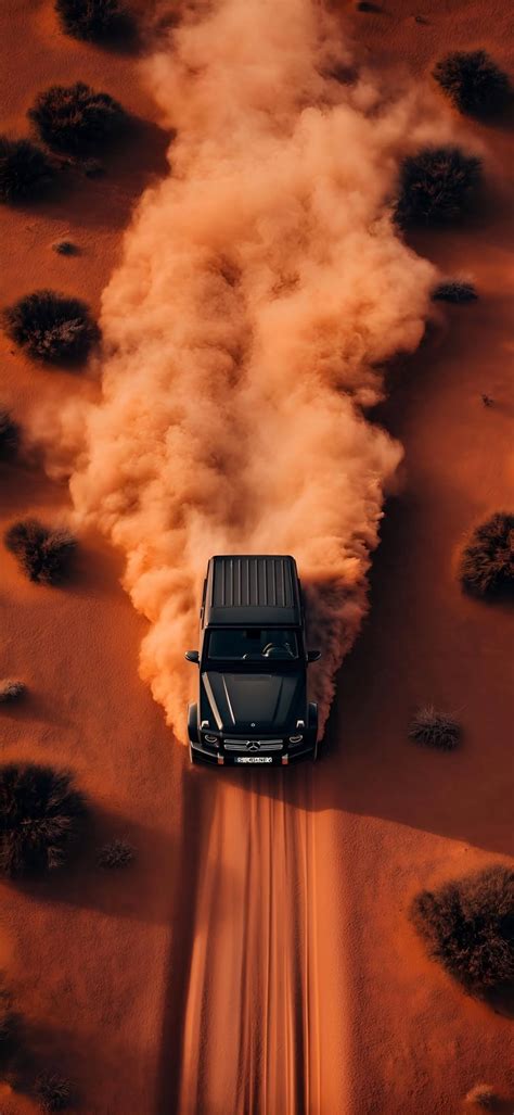 Off Road Vehicle In Desert Sand Cloud Reddish Brown Terrain 4k