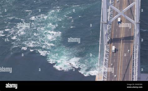 An Aerial Photo Shows Naruto Whirlpools Under Naruto Ohashi Bridge Off