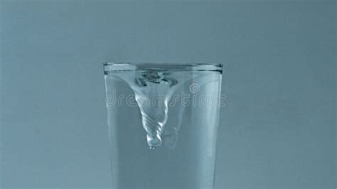 Clear Cold Water Vortex Inside Glass Container Closeup Ice Cocktail