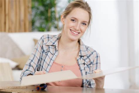 Happy Woman With Self Assembly Furniture In Kitchen Stock Image Image