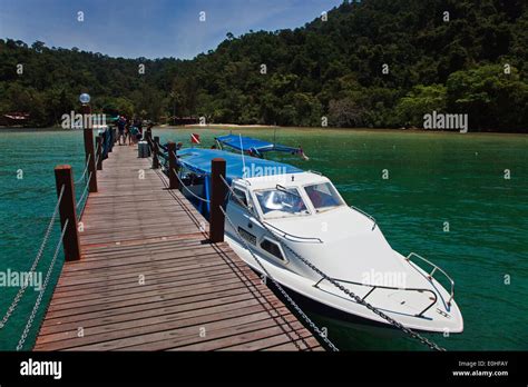 Snorkeling Boat Docked On The Island Of Pulau Gaya In The Tunku Abdul