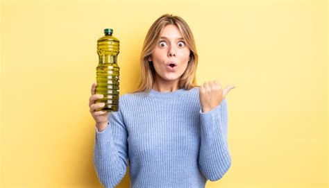 Premium Photo Pretty Blonde Girl Looking Astonished In Disbelief