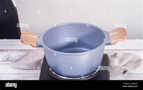 Step By Step Preparing Mixed Berry Compote From Frozen Berries In A Nonstick Cooking Pot Stock