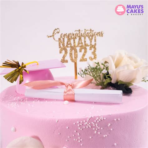Pink And Flowers Graduation Cake Mayus Cakes And Bakery