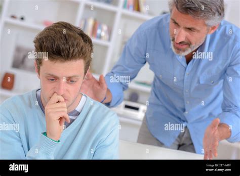 Teen Father Son Talking Sofa Hi Res Stock Photography And Images Alamy