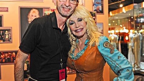 See Knox News Staffers With Dolly Parton As They Report On Dollywood