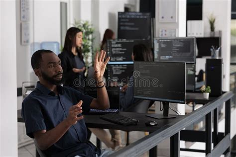 Software Developer Checking Source Code Using Ar Hologram Stock Image
