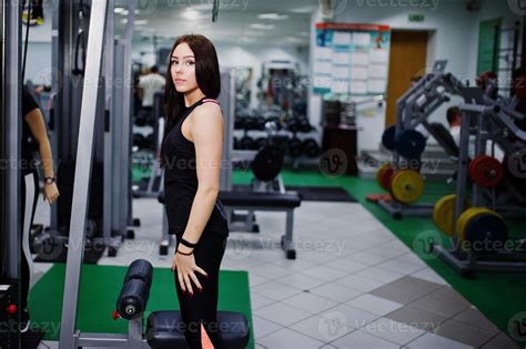 Young Sport Girl Workout In Gym Fitness Woman Doing Exercises