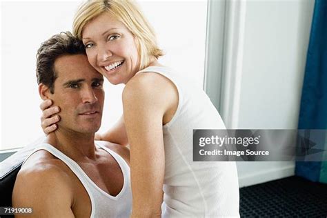 Mature Couple Embracing In Hotel Room Portrait Photos And Premium High Res Pictures Getty Images