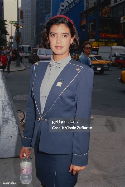 Phoebe Cates Poses In Front Of An Electronics Store New York City
