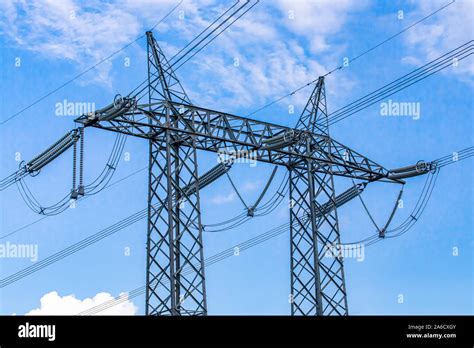 Electric Transmission Insulators Are Seen In Detail With Arcing Horns