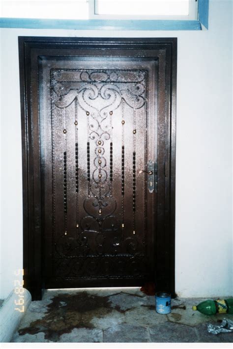 مصنع الأمان للأبواب والمشغولات الحديدية ابواب أمان