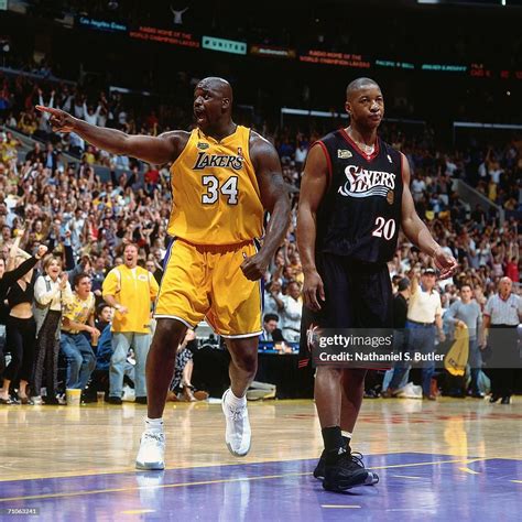 Shaquille Oneal Of The Los Angeles Lakers Points To The Fans During