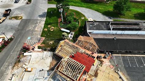 Construction Progress Of A New Building In A Commercial Area Shows