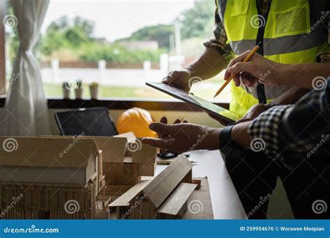 Architect Man Working With Blueprints For Architectural Plan Engineer