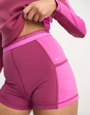 Nike Training Pro Femme Dri Fit Halve Booty Short Van Inch In Paars Asos