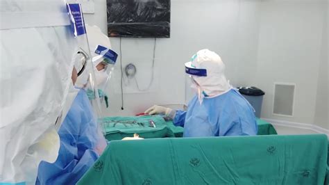 Asian Surgeon Wear Ppe Perform Upper Body Surgery For Contagious